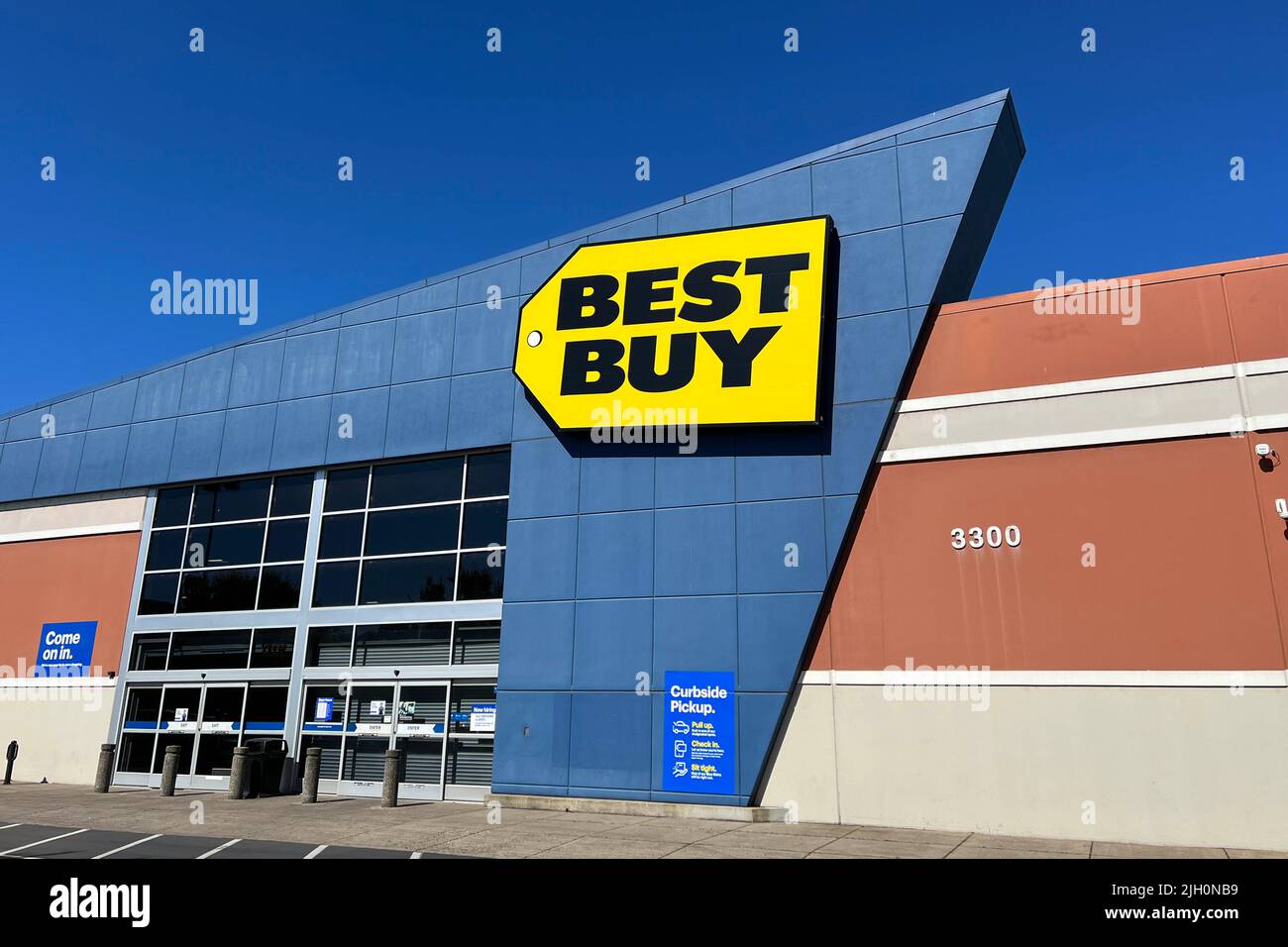 A Best Buy electronics store logo sign at the Gateway Shopping Center ...