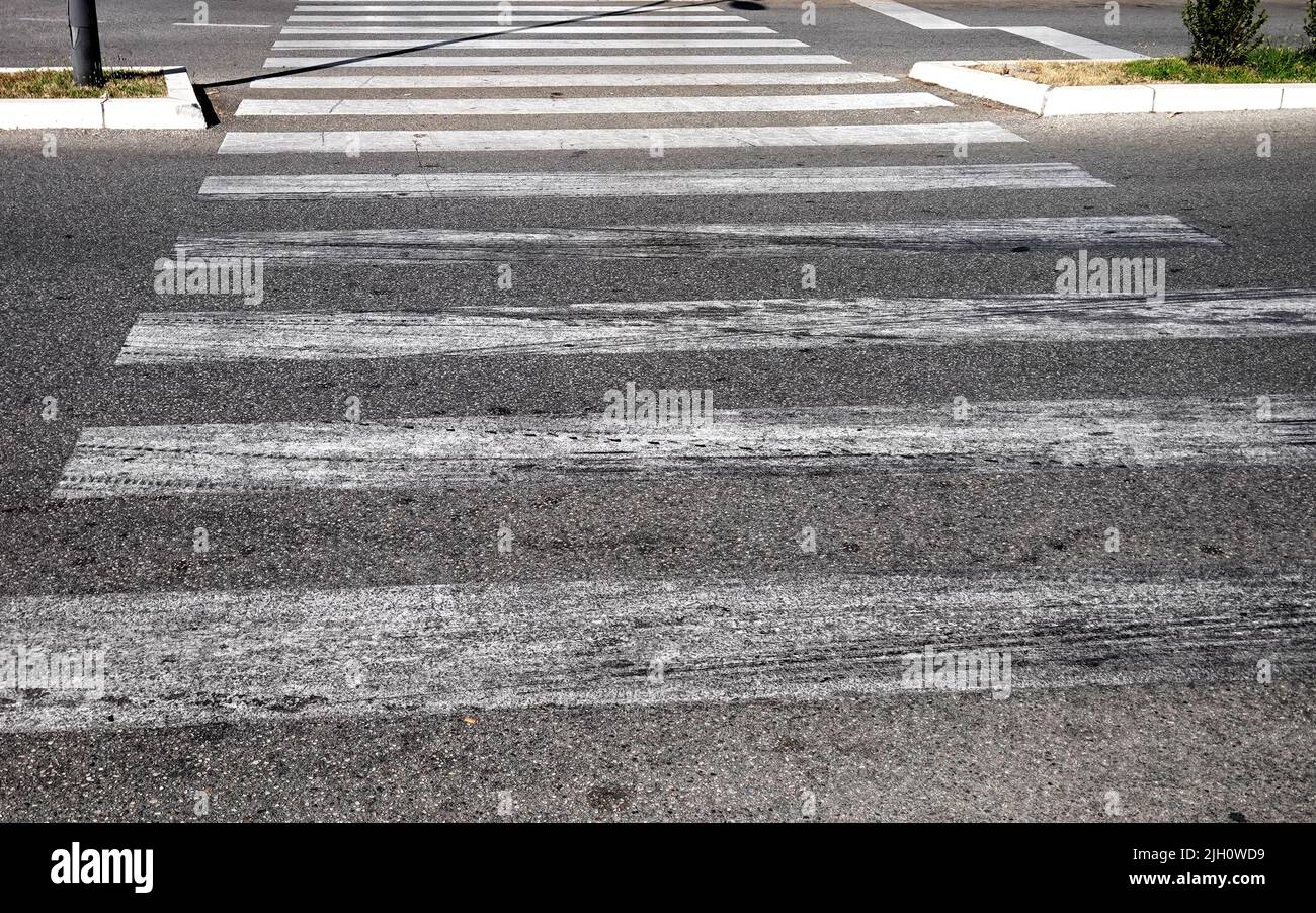 Zebra crosswalk on an asphalt road Stock Photo - Alamy