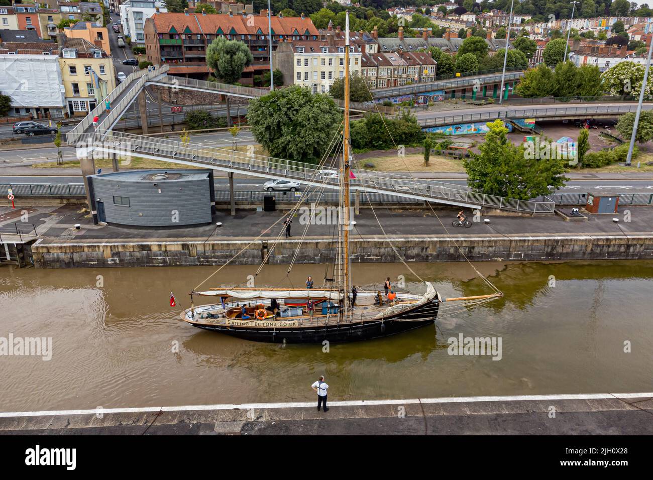 A tall ship approaches a lock along the River Avon at Cumberland Basin ...