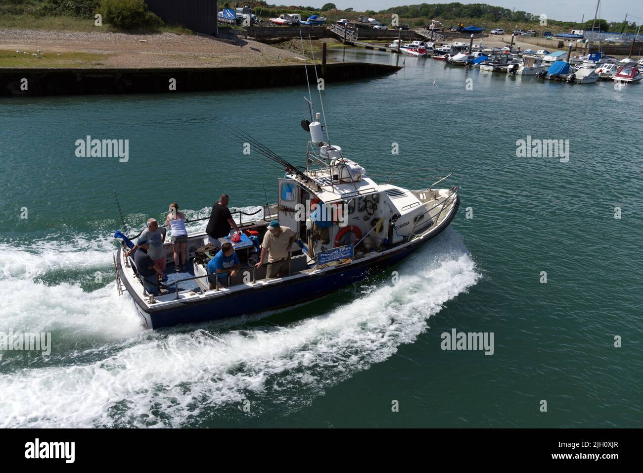 Fishing boat Dobhran returning to Littlehampton on the River Arun full ...