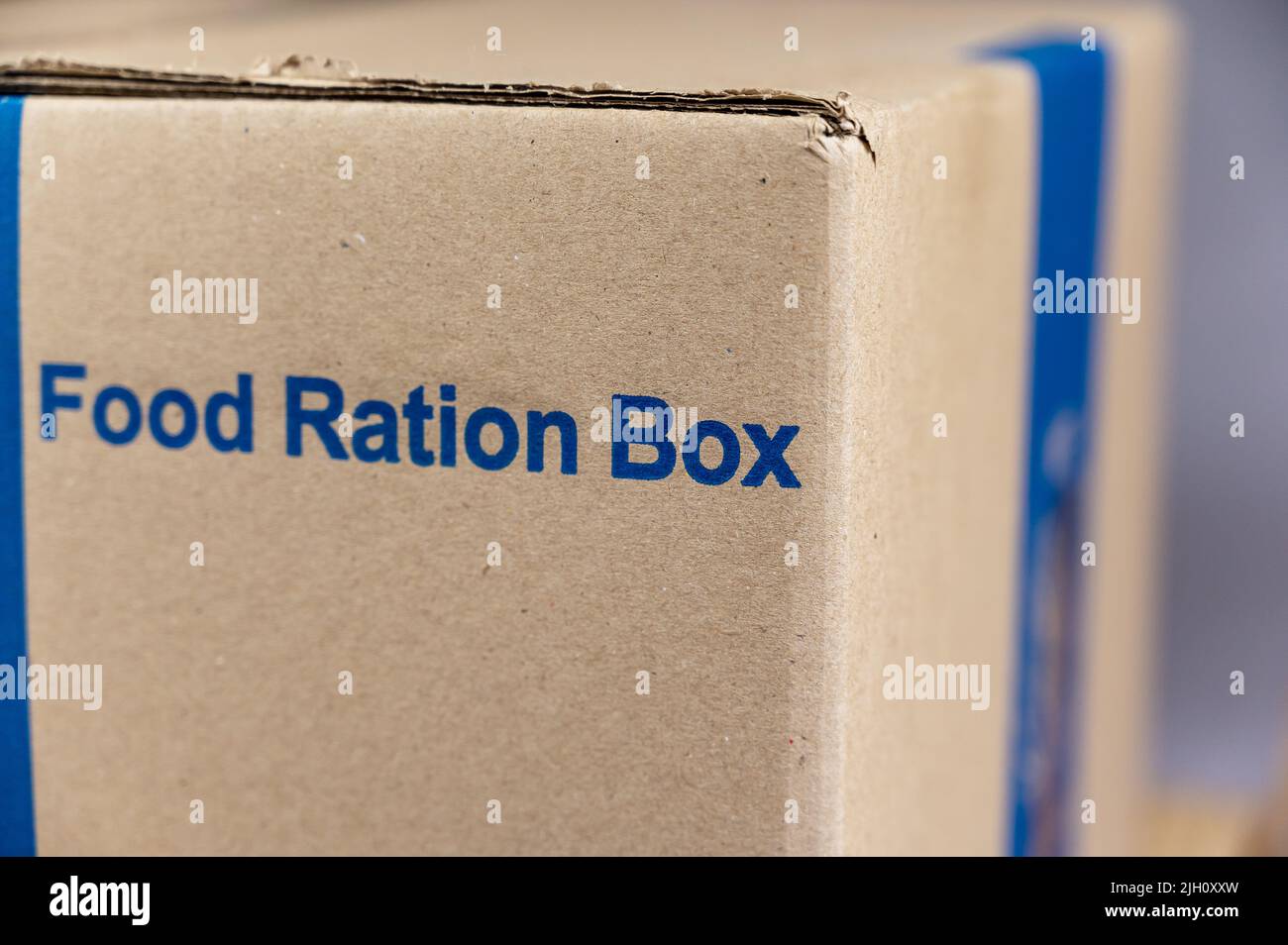 Food Ration Box. Blue lettering on a brown cardboard box. Humanitarian ...