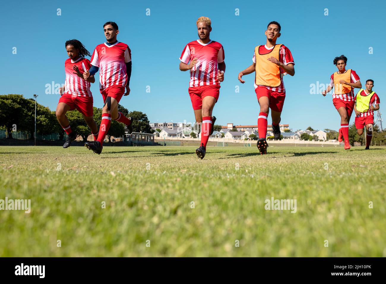 Red and blue uniforms hi-res stock photography and images - Alamy