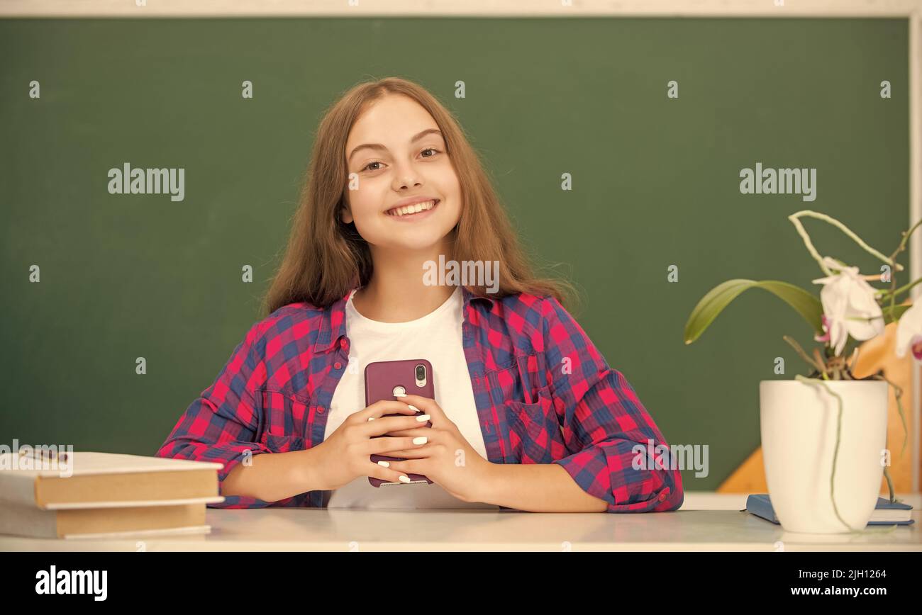 september 1. child typing and texting. sms and instant messaging Stock ...