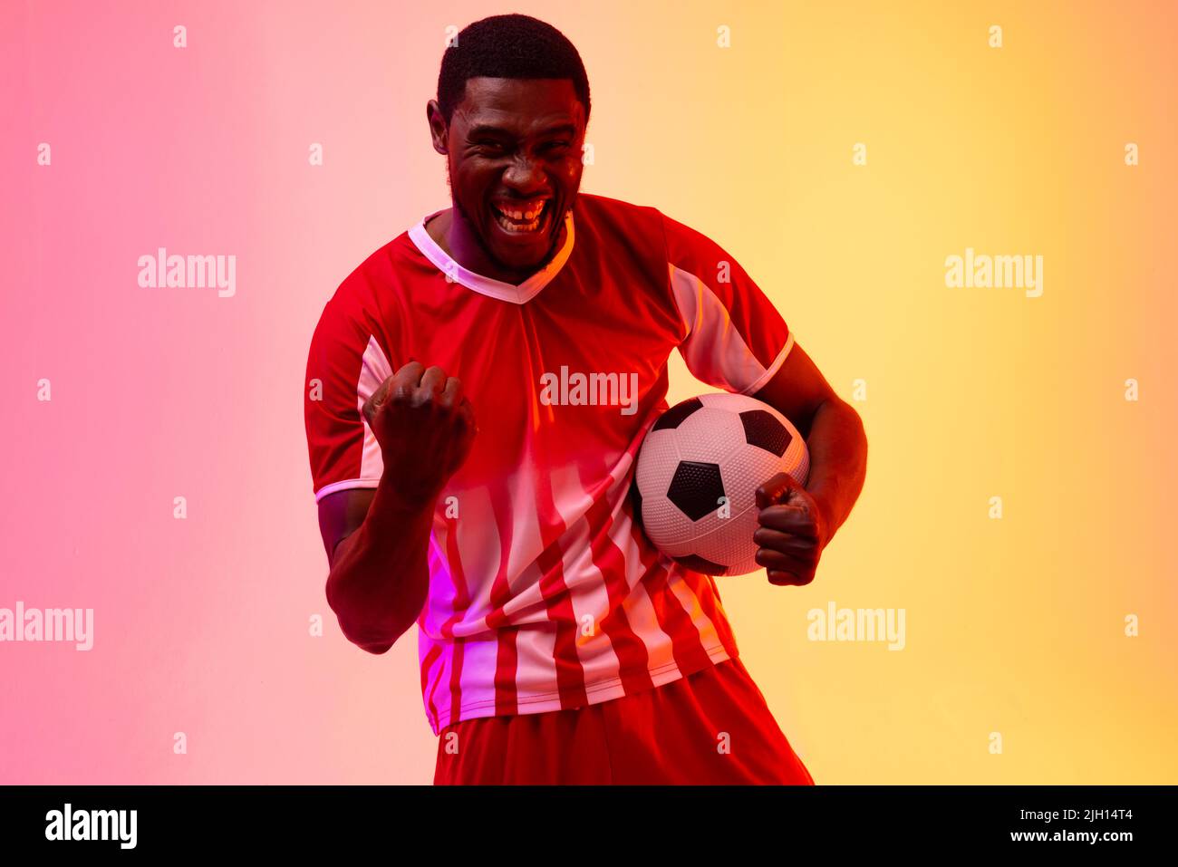 Happy soccer player hi-res stock photography and images - Alamy