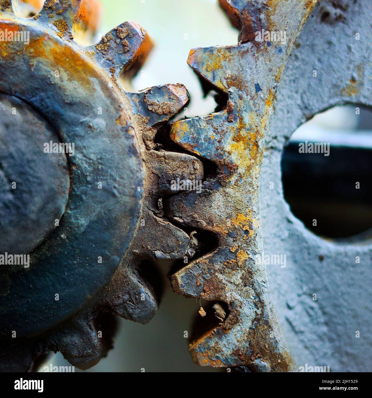 rusty mechanical gear stack in a garage Stock Photo - Alamy