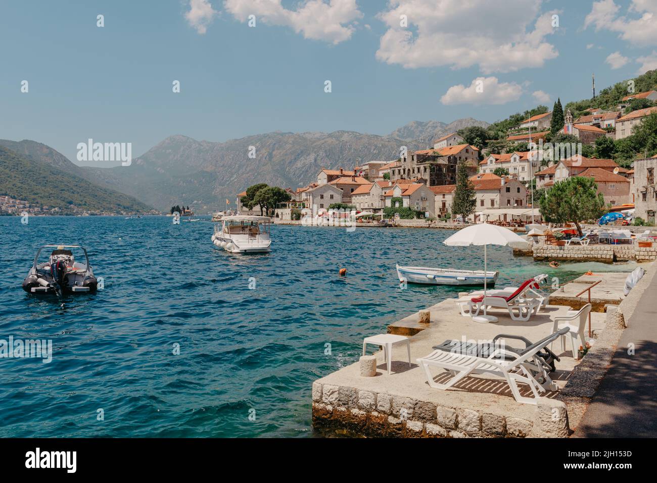 Luxury boat yacht in Adriatic sea in Montenegro with scenic mountains ...
