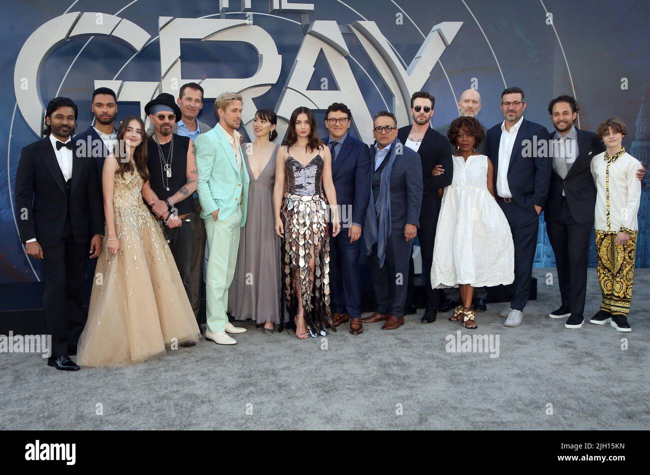 Hollywood, California, USA. 13th July, 2022. Dhanush, RegÃ-Jean Page ...