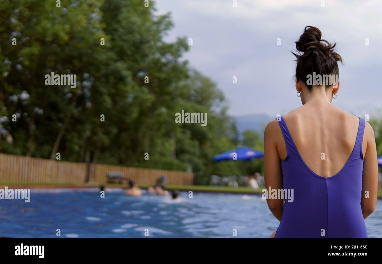 Back of a swimmer in a pool Stock Photo - Alamy