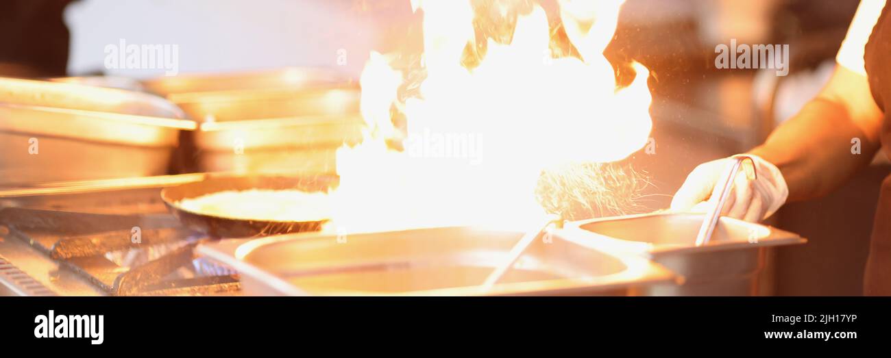 Chef stove cooking closeup hi-res stock photography and images - Alamy