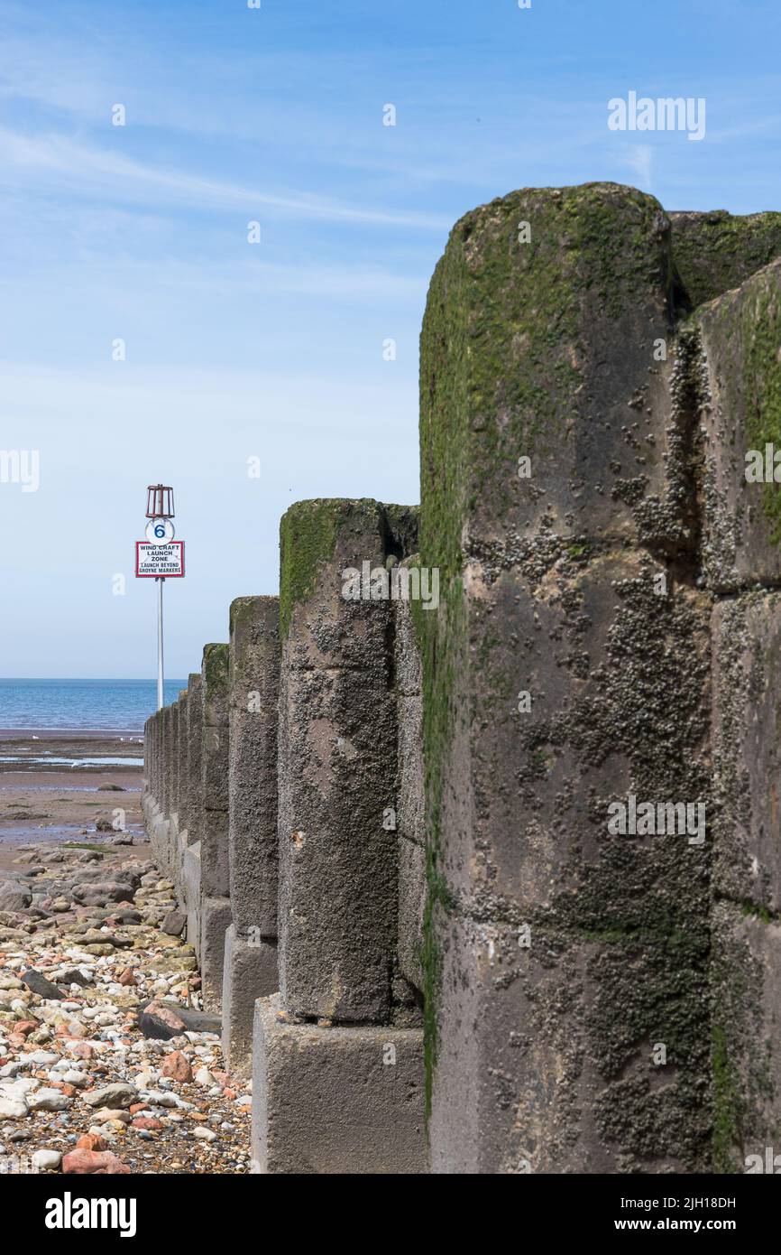 Concrete gryone No.6 seen on Hunstanton beach marker showing wind craft ...