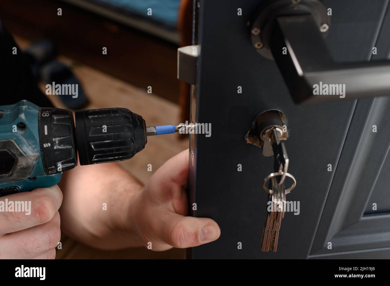 Installation of lock and door handle to interior doors, locksmith works ...