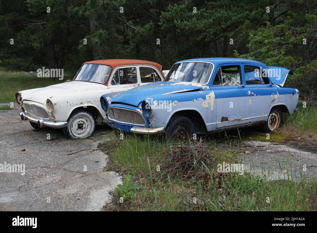 2 aronde simca vintage cars parked in the forest in france Stock Photo ...