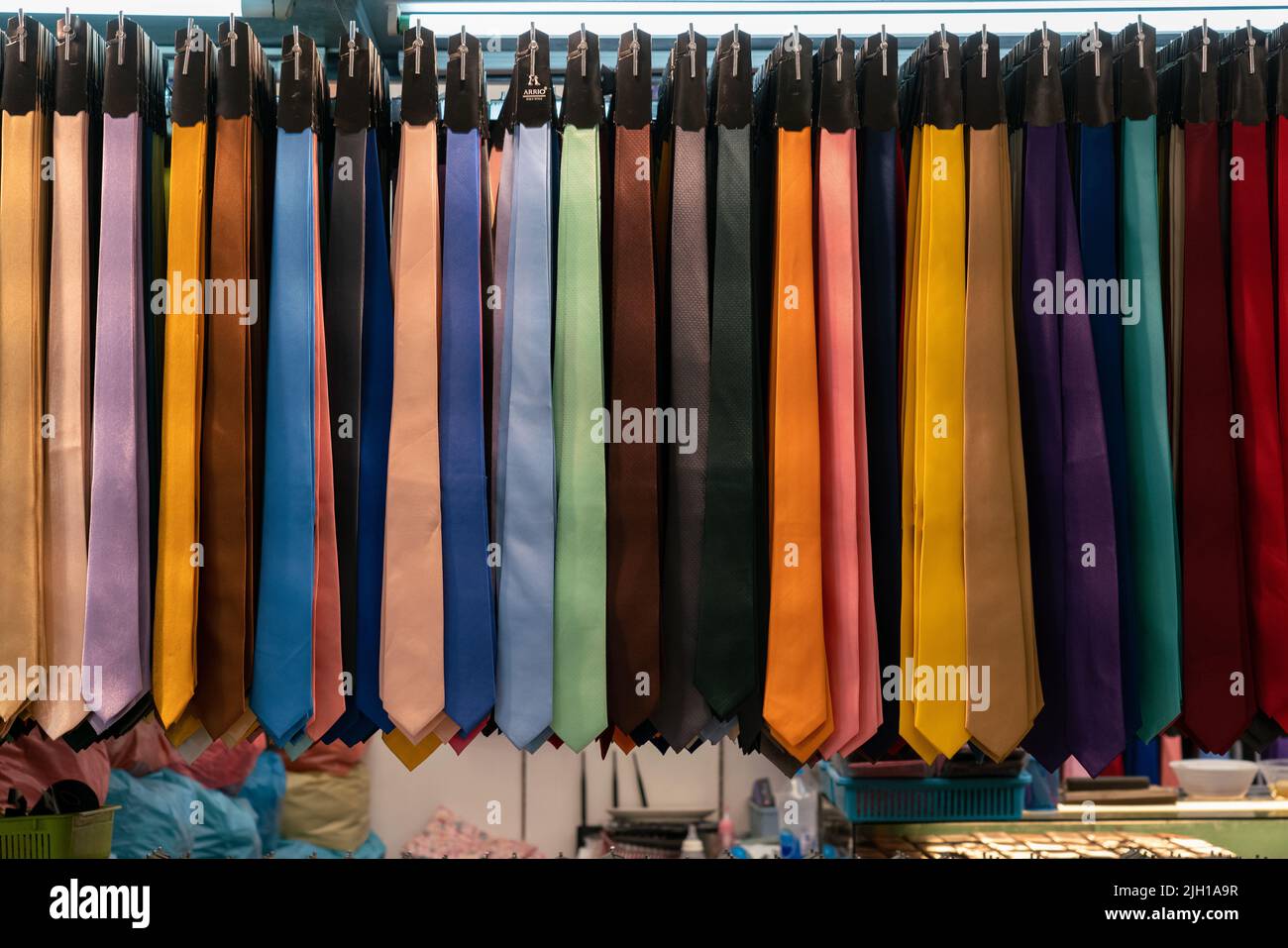 Multi color ties on store display. Horizontal shot Stock Photo - Alamy