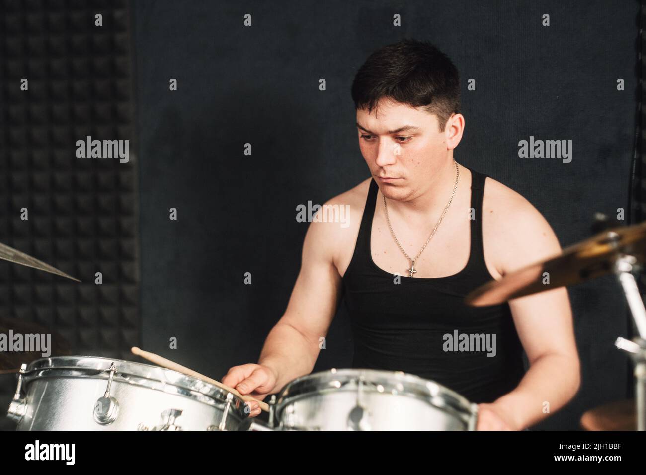 Plays the drum hi-res stock photography and images - Alamy