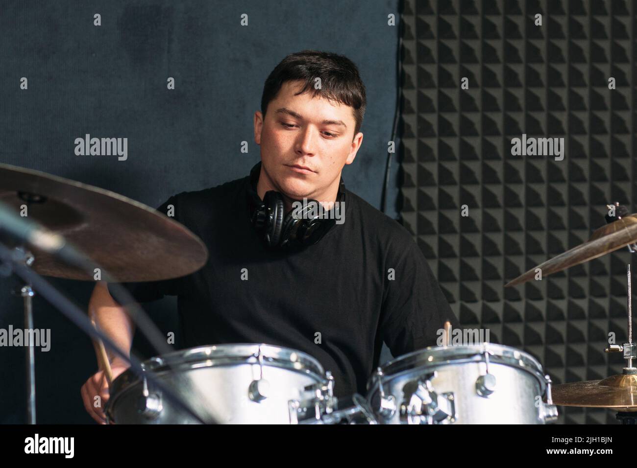 Playing composition drummer close up Stock Photo - Alamy