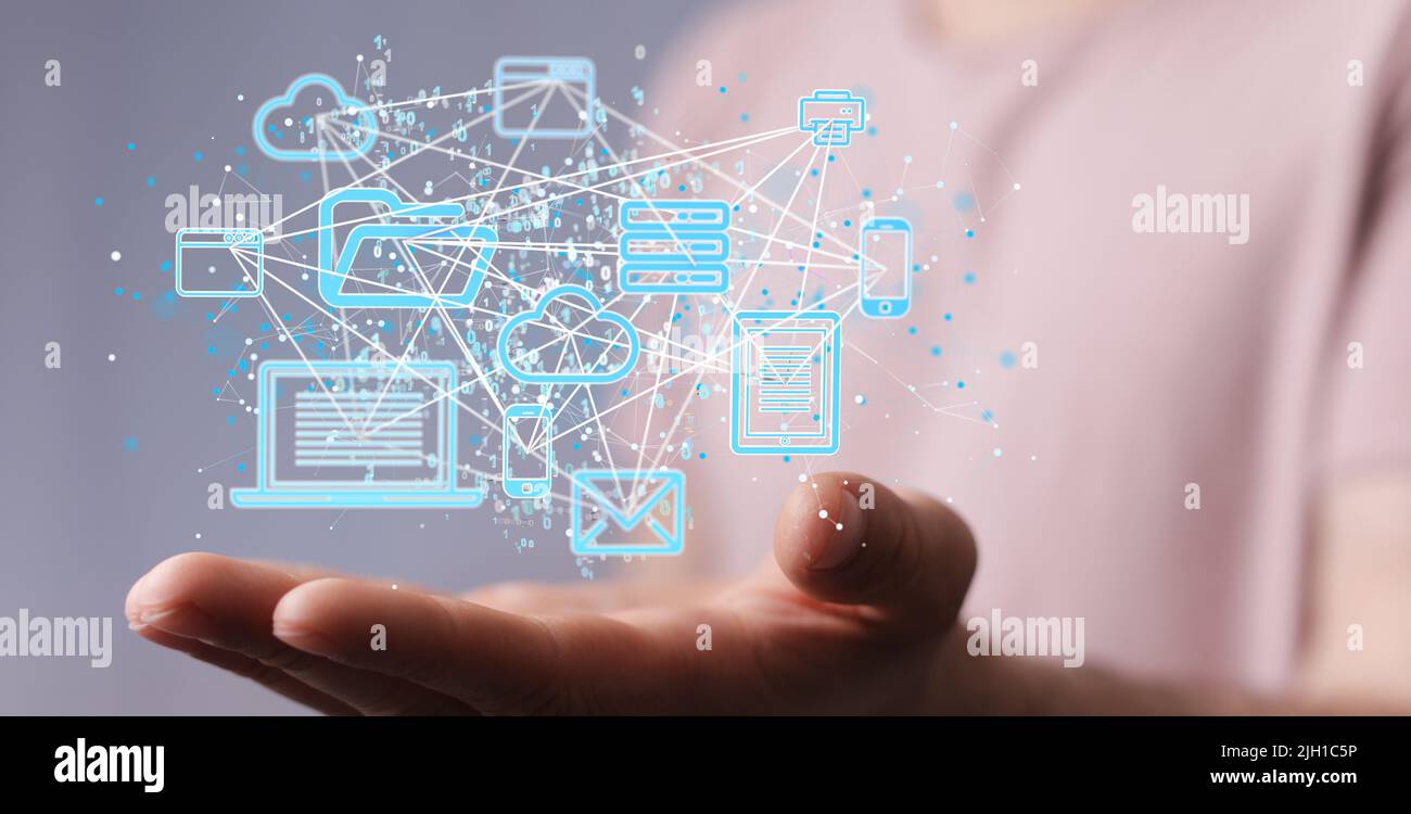 A person presenting a virtual projection of cloud computing Stock Photo ...