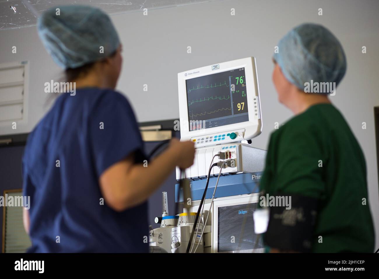 Medical staff in a theatre environment Stock Photo - Alamy