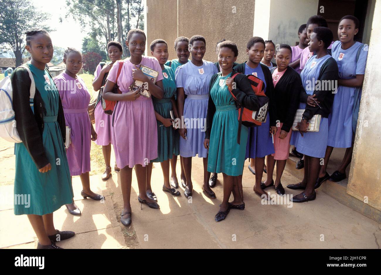 Uganda, Kampala; Portrait of a group of highschool girls at girls ...