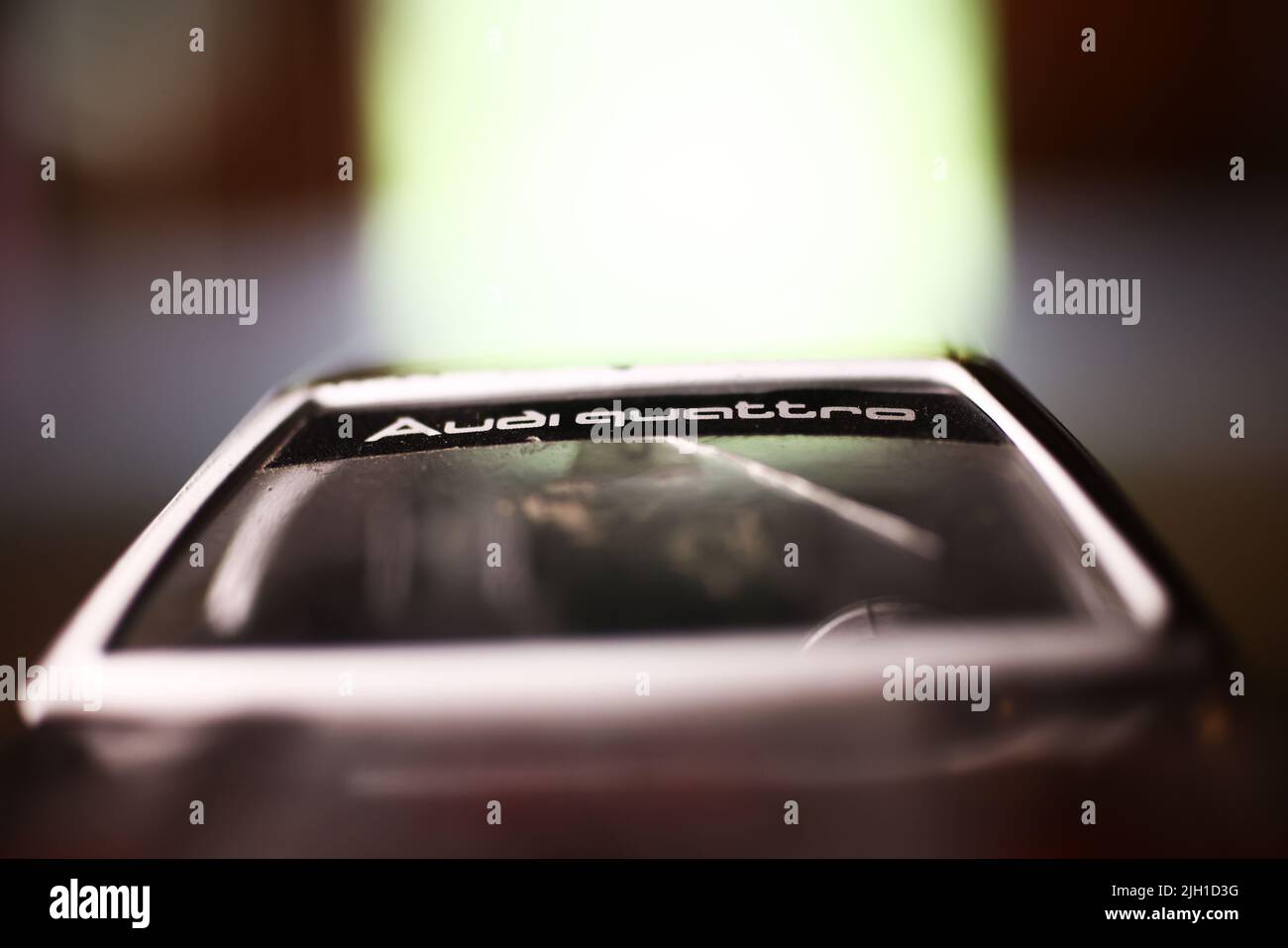 Toys in a box in an attic of a house. Here are small toy cars, a Audi ...