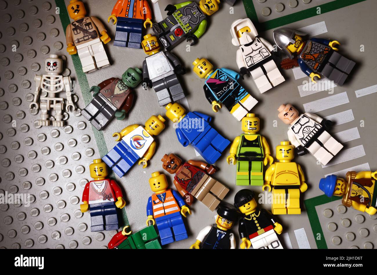 Toys in a box in an attic of a house. Lego, a line of plastic ...