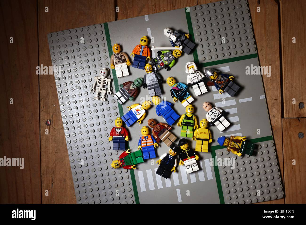 Toys in a box in an attic of a house. Lego, a line of plastic ...