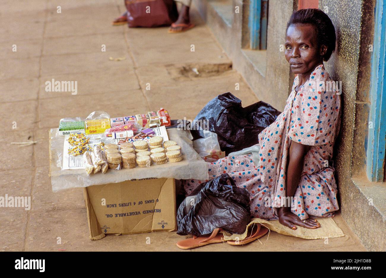 Uganda, Kampala; woman selling biscuits on the streets Stock Photo - Alamy