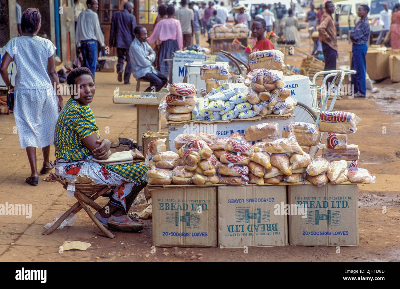 Uganda, Kampala; woman selling bread at street market Stock Photo - Alamy