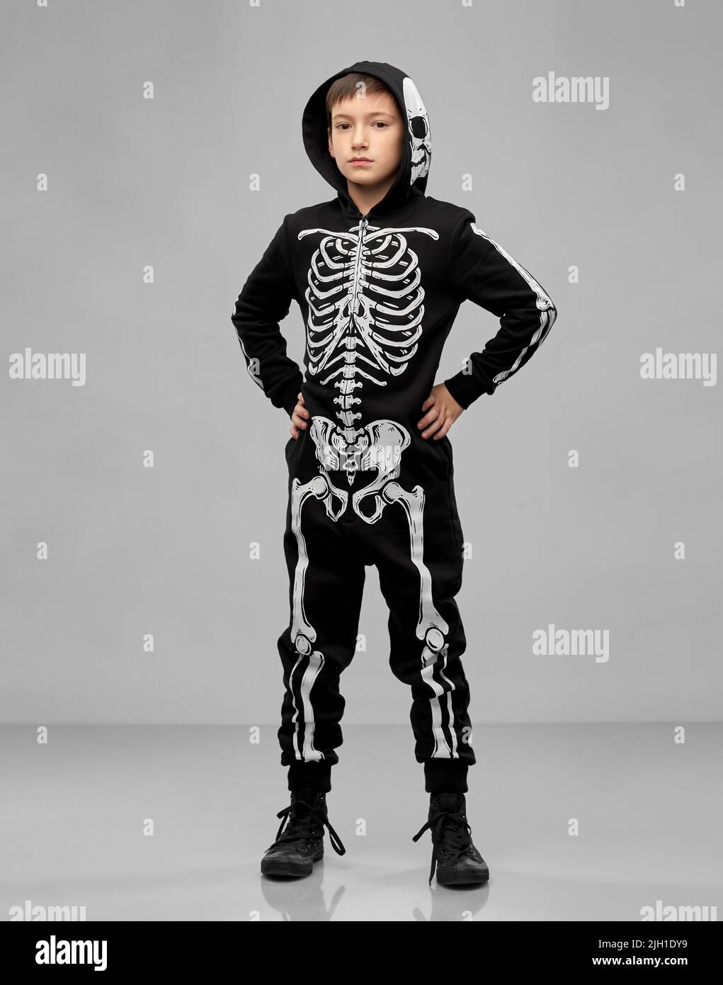 boy in black halloween costume with skeleton bones Stock Photo - Alamy