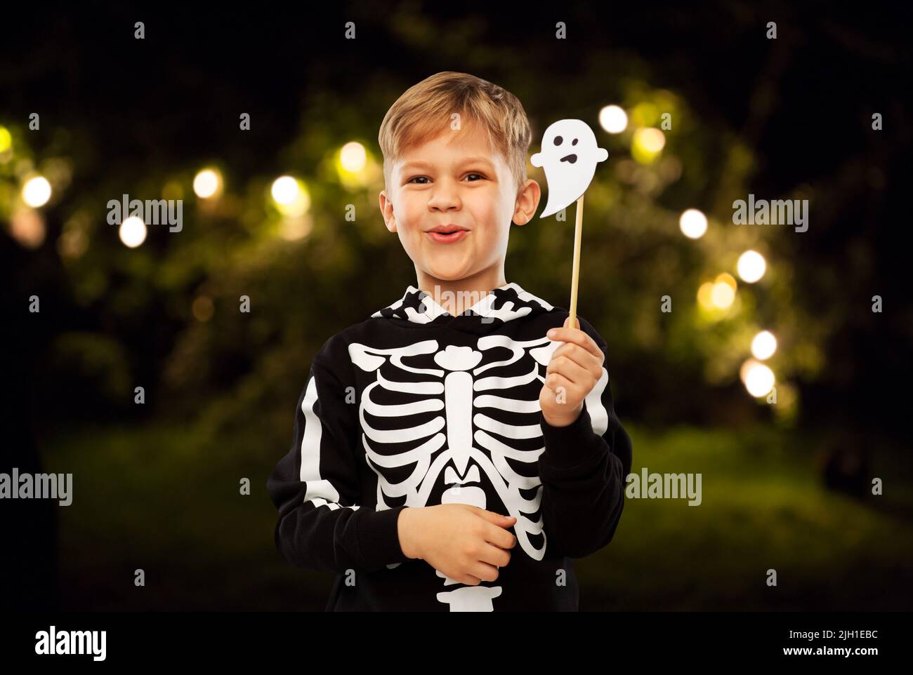 boy in halloween costume with ghost decoration Stock Photo - Alamy