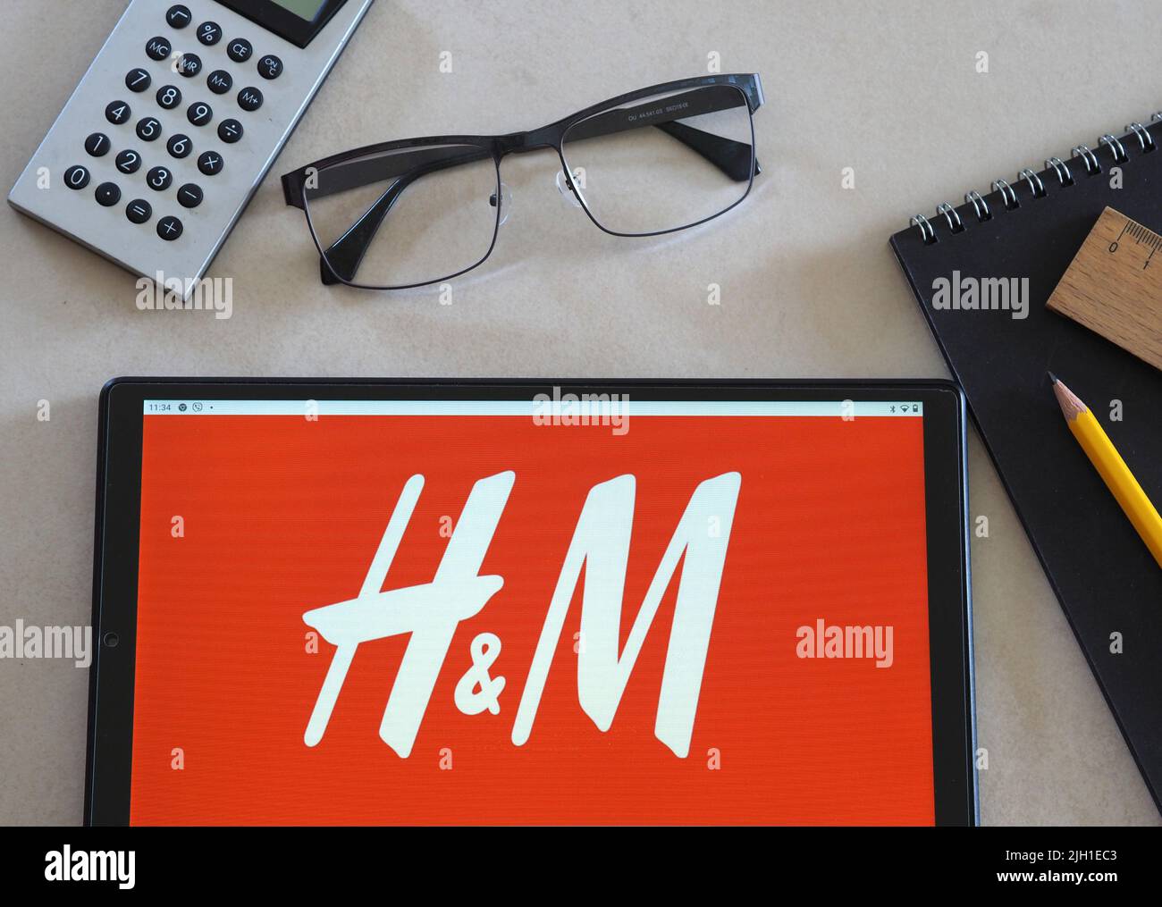 In this photo illustration, H & M Hennes & Mauritz AB or H&M Group logo ...