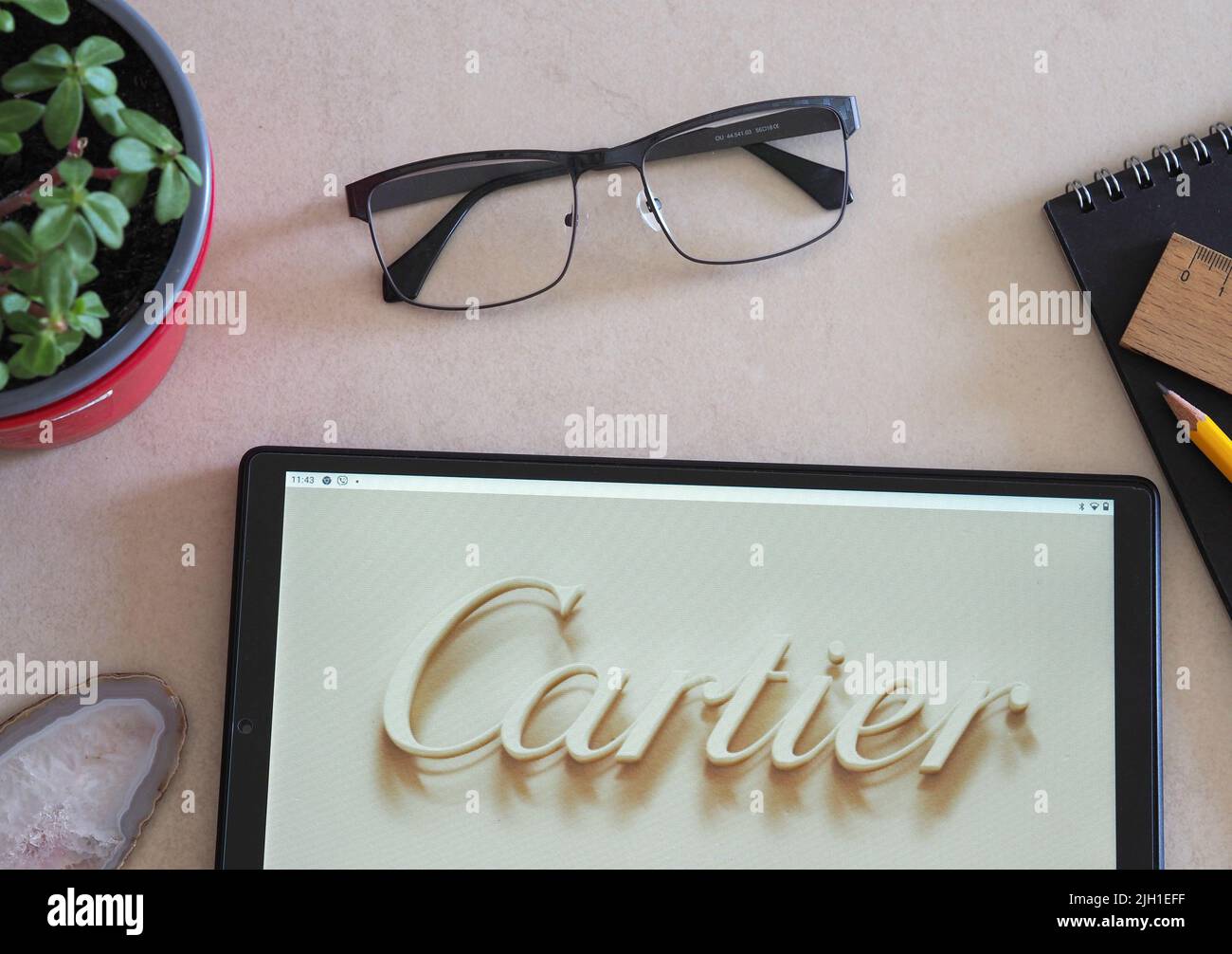 In this photo illustration, CARTIER International SNC logo seen ...