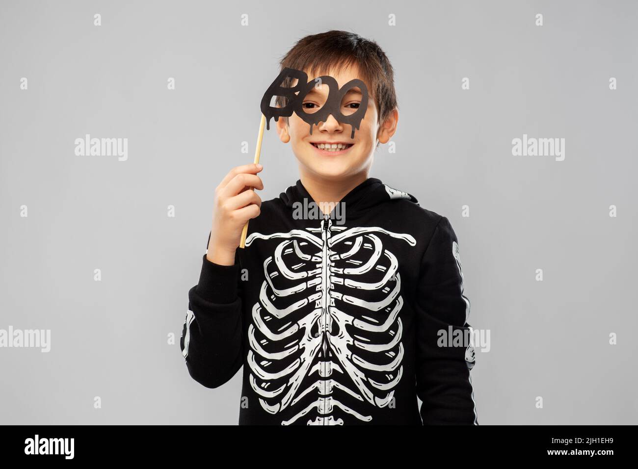boy in halloween costume of skeleton with props Stock Photo - Alamy