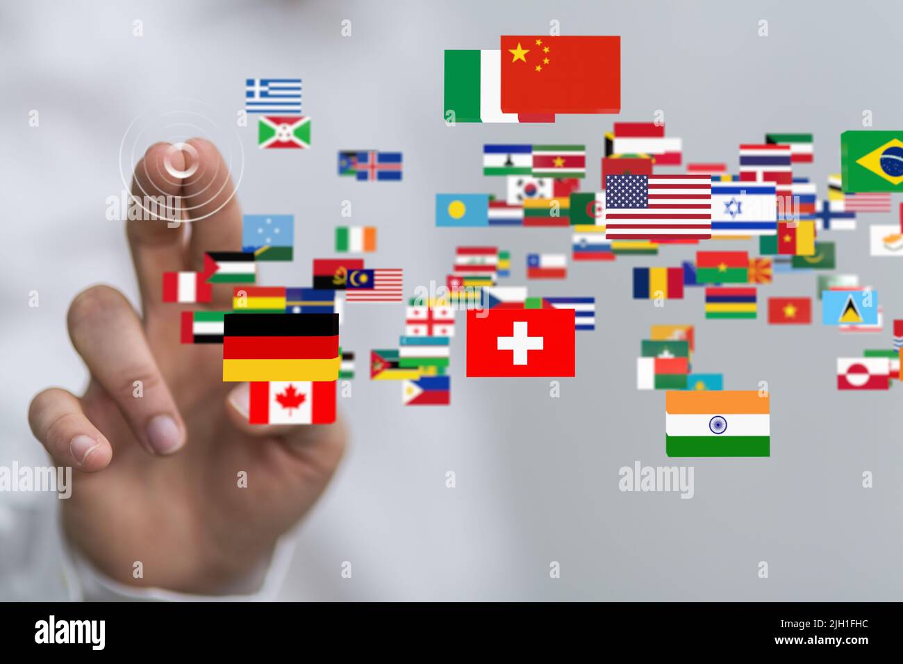 A 3D render of connected world flags near a hand Stock Photo - Alamy