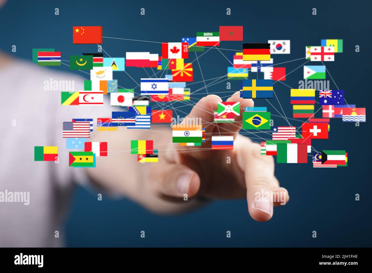 A 3D render of connected world flags near a hand Stock Photo - Alamy