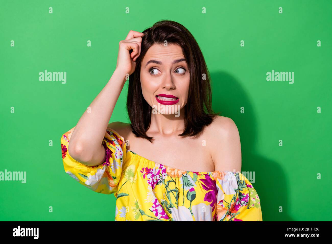 Portrait of minded person grin teeth scratch head look empty space ...