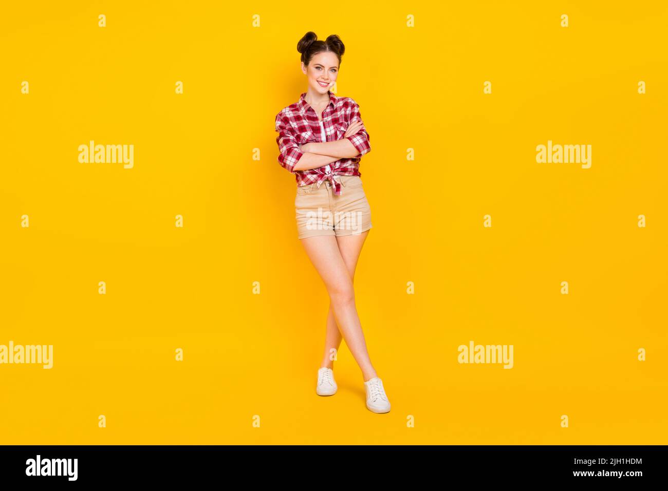 Full length photo of positive cheerful youngster lady standing isolated ...