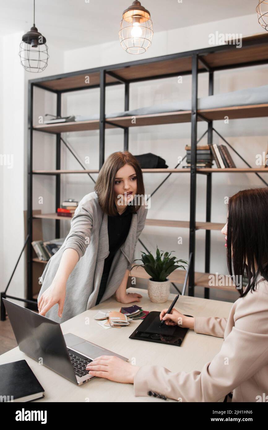 Managers discussing new digital project Stock Photo - Alamy