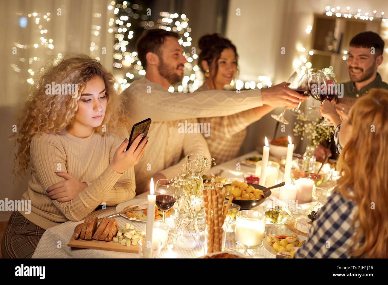 Beautiful woman at dinner party hi-res stock photography and images - Alamy