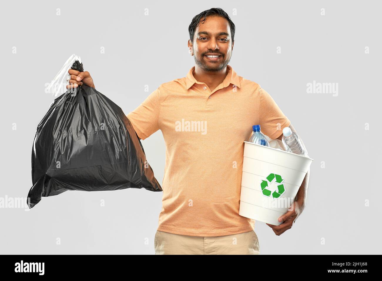 Man sorting rubbish hi-res stock photography and images - Alamy