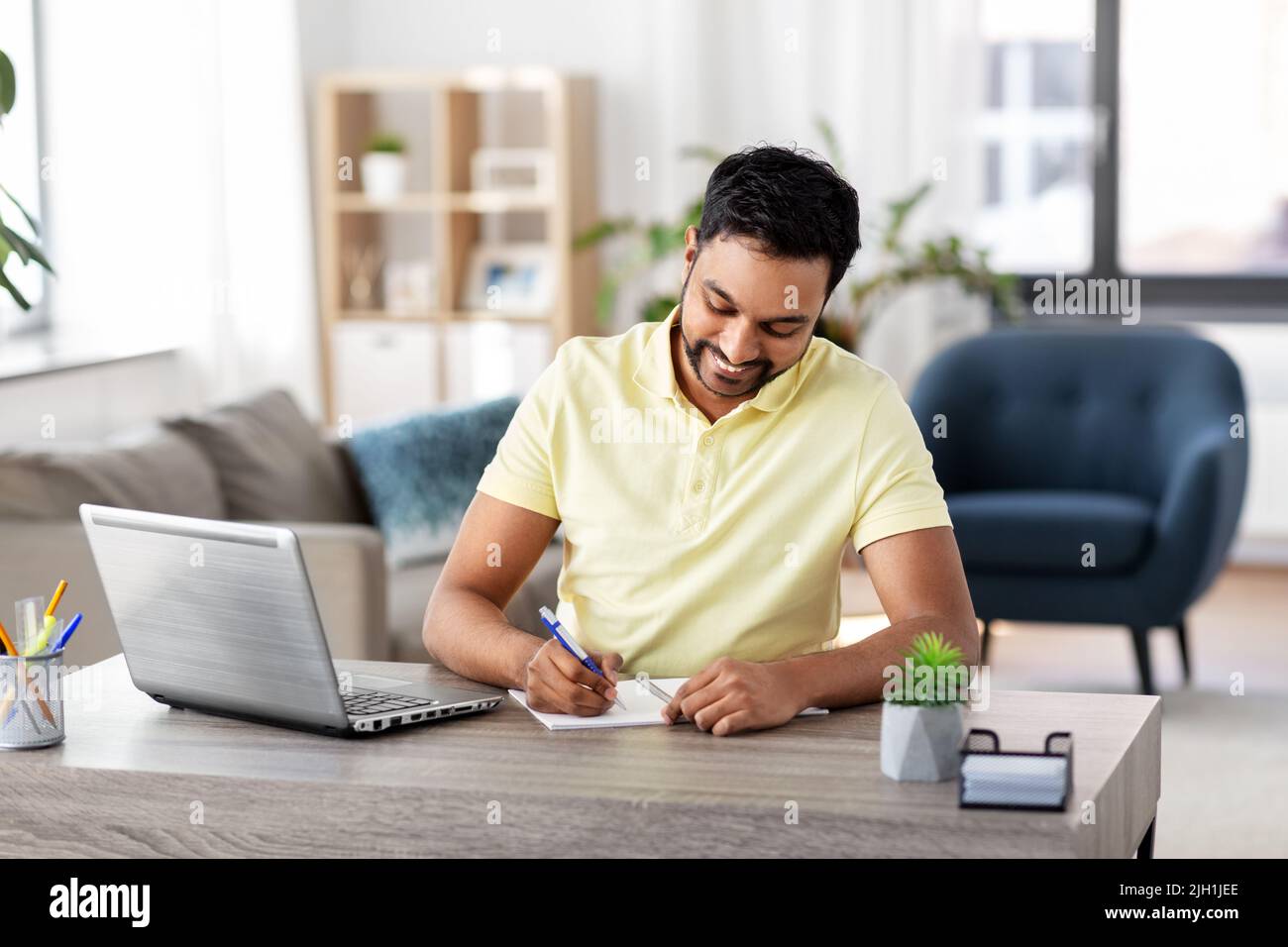 Man notebook writing hi-res stock photography and images - Alamy