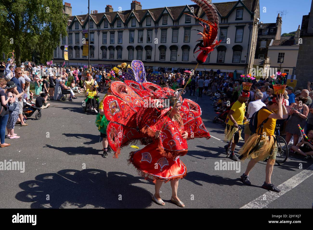 Carnival parade progressing through the streets of the historic city of ...