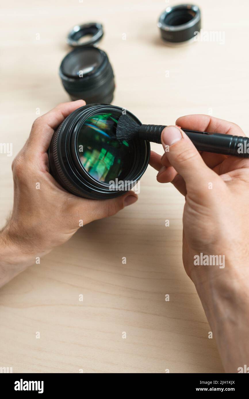 Cleaning lens hi-res stock photography and images - Alamy