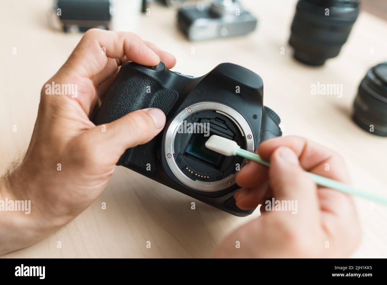 Cleaning glass camera hi-res stock photography and images - Alamy