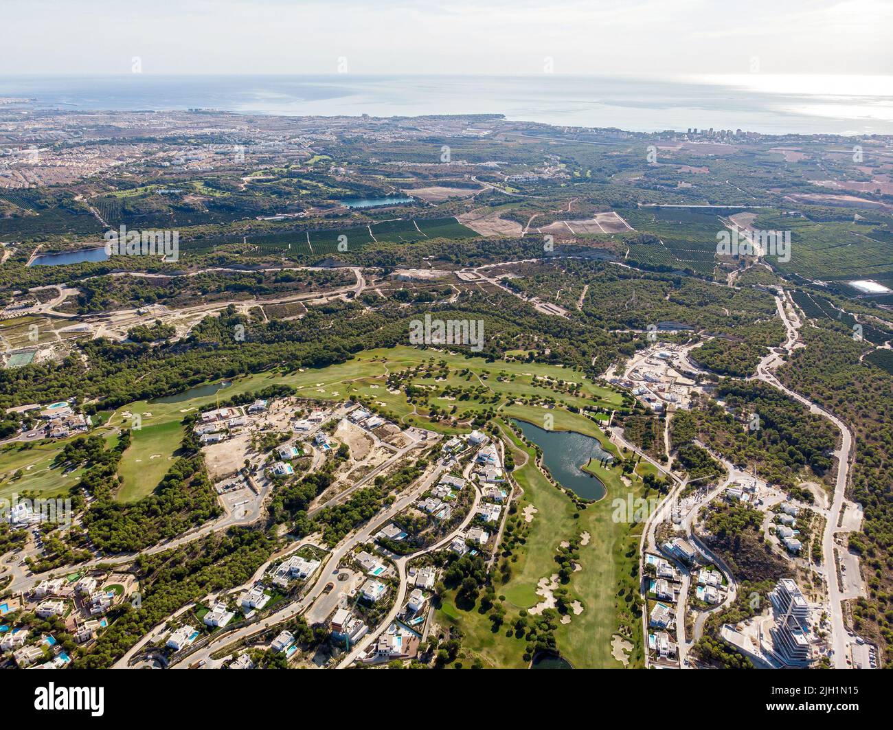 An aerial view of Spanish Las Colinas golf course with modern luxury ...