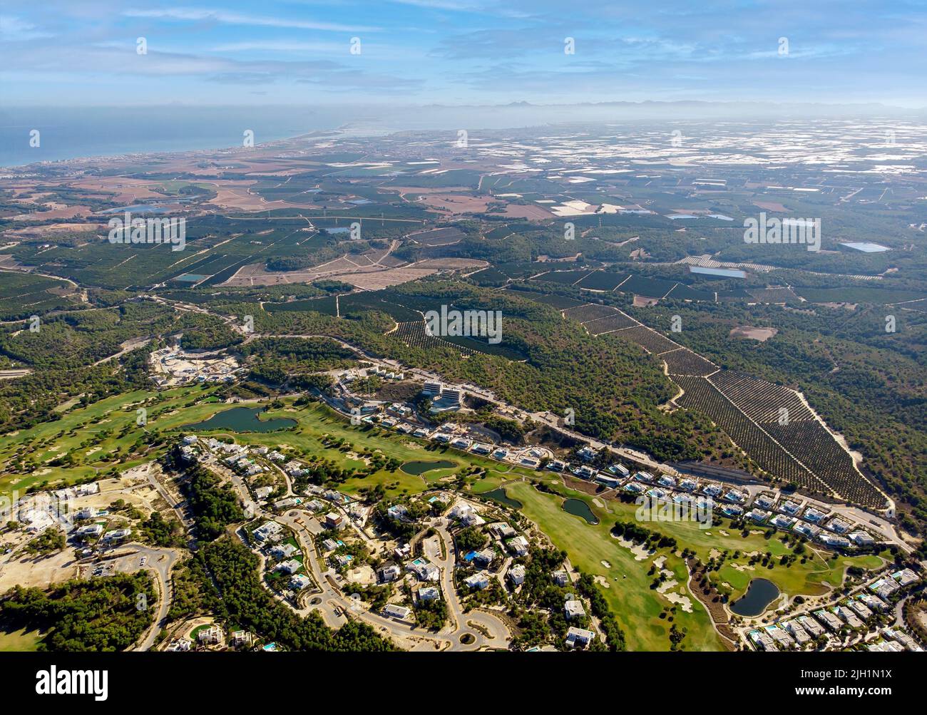 An aerial view of Spanish Las Colinas golf course with modern luxury ...
