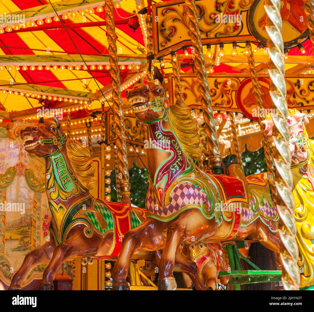 Fairground horses on a traditional carousel ride in York,North ...