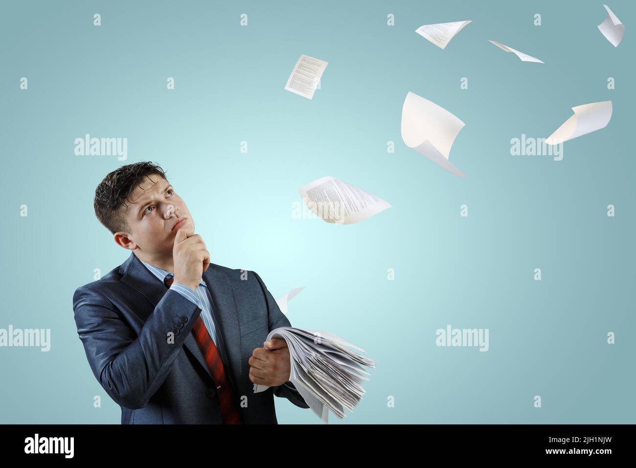 Business Concept - handsome young professional businessman holding ...