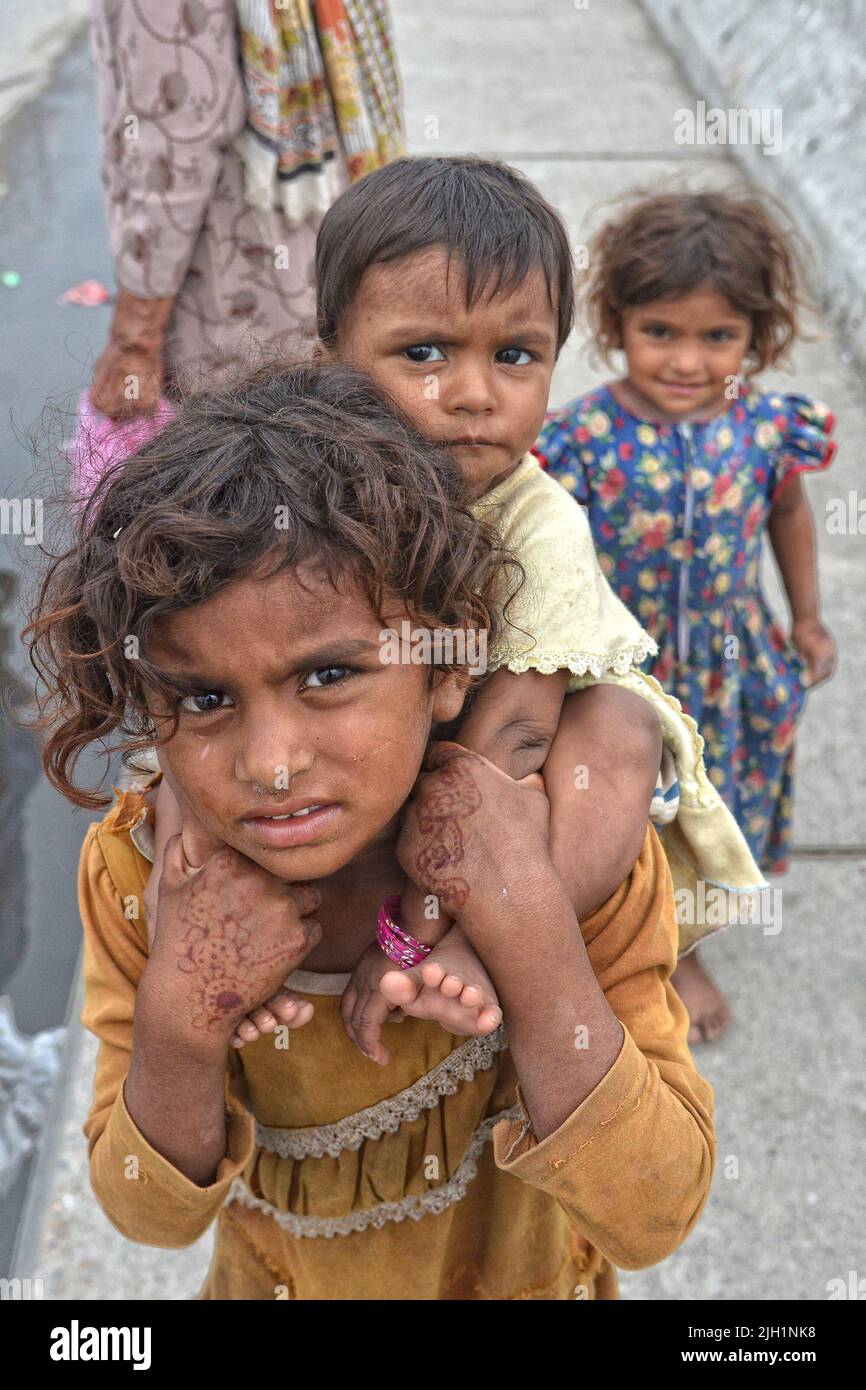 Lahore, Pakistan. 13th July, 2022. Pakistani people are busy in their ...