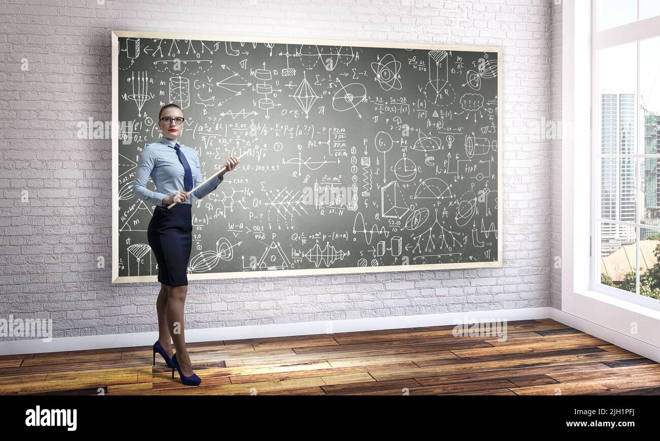 Strict female teacher . Mixed media Stock Photo - Alamy