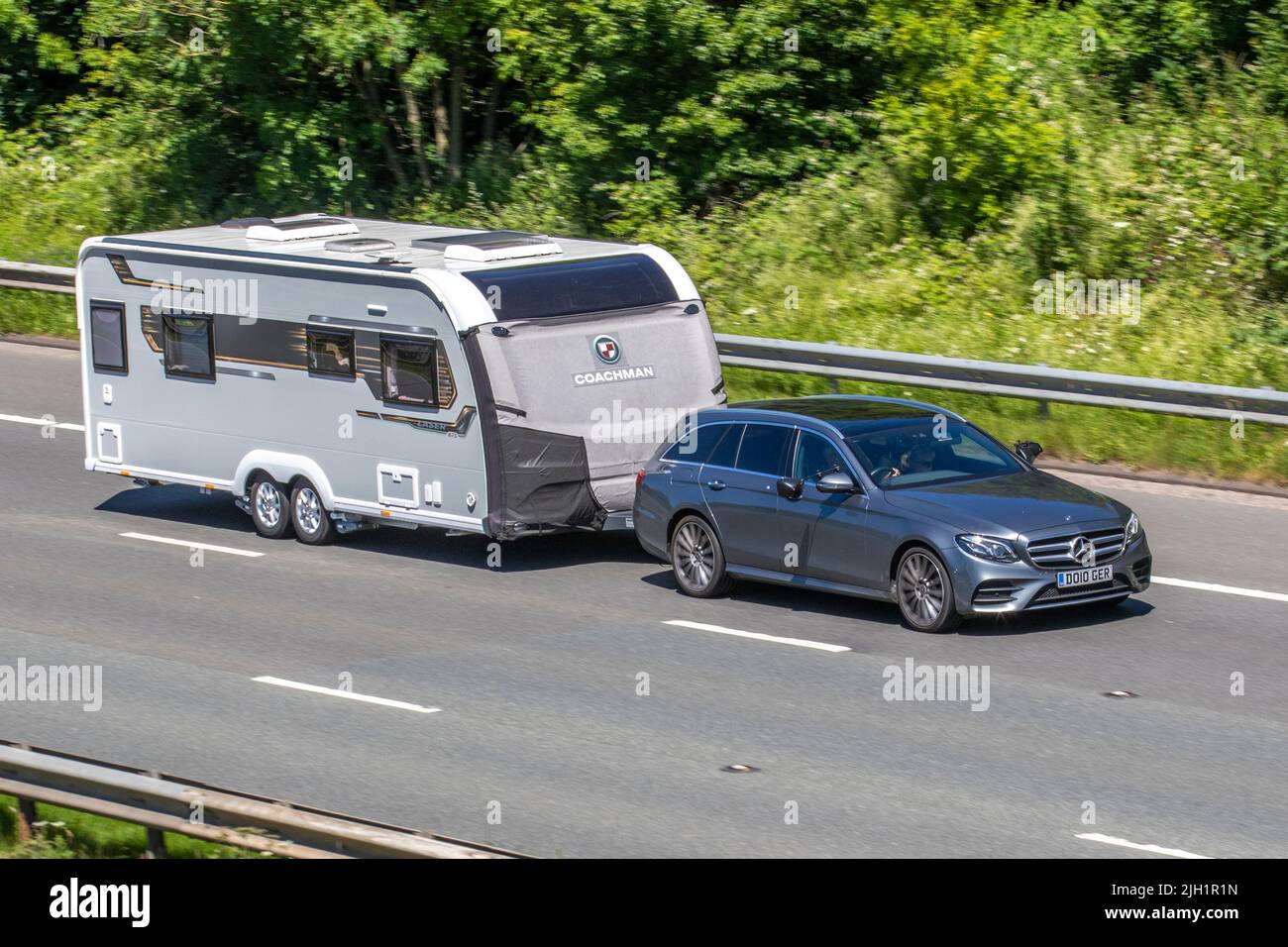 2023 Coachman Laser Xcel 875, twin axle, 4 berth caravan being towed by ...